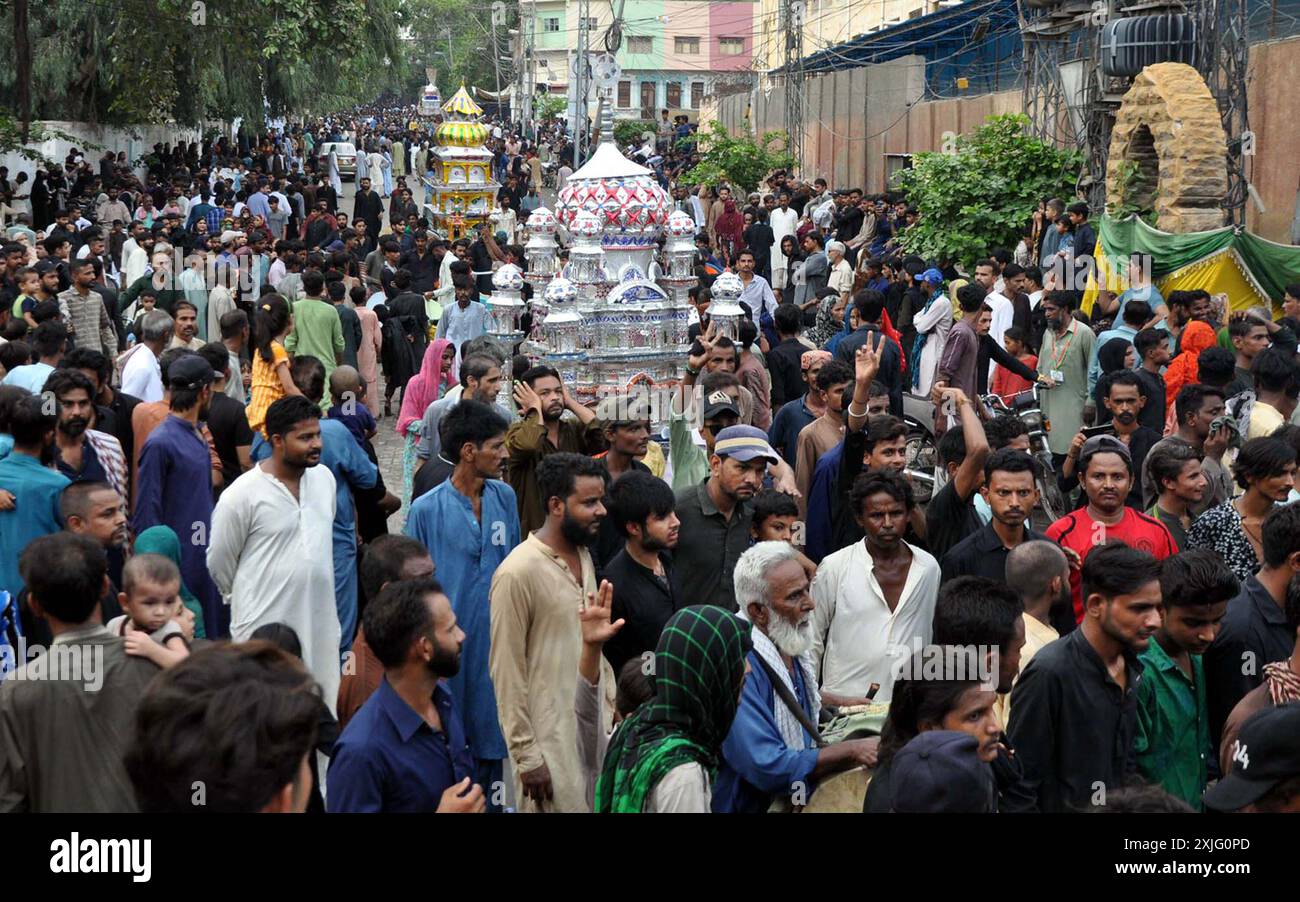 Sunni Muslims take part in Taziya procession during religious ...