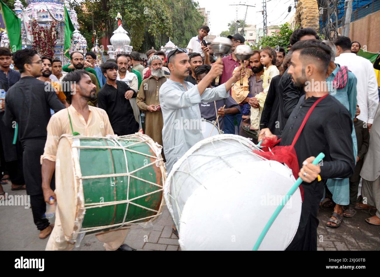 Sunni Muslims take part in Taziya procession during religious ...