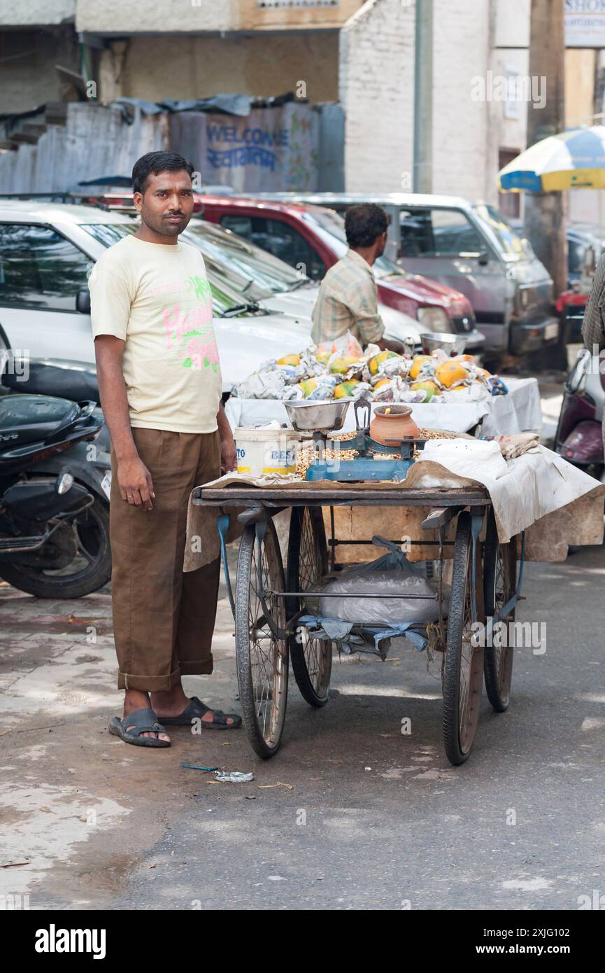 Busy bustling indian man selling stall hi-res stock photography and ...