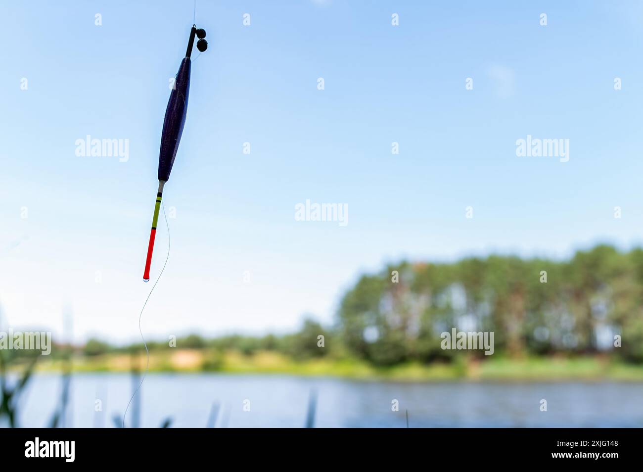 A Fishing Float Floats in the Air of the Lake and Nature Background ...