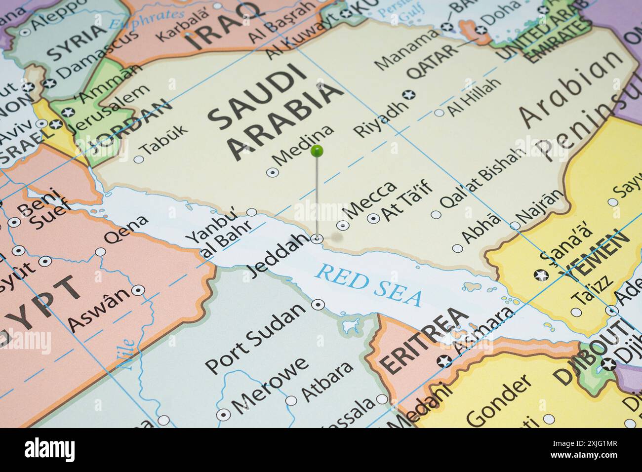 Close up to a Jeddah city with a green pin needle into Saudi Arabia ...
