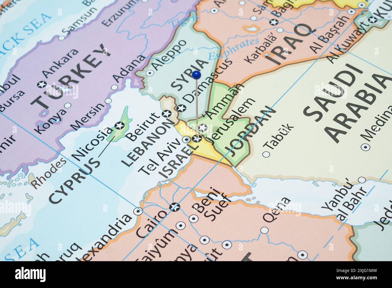 Close up to a Jerusalem city with a blue pin needle into Israel country ...