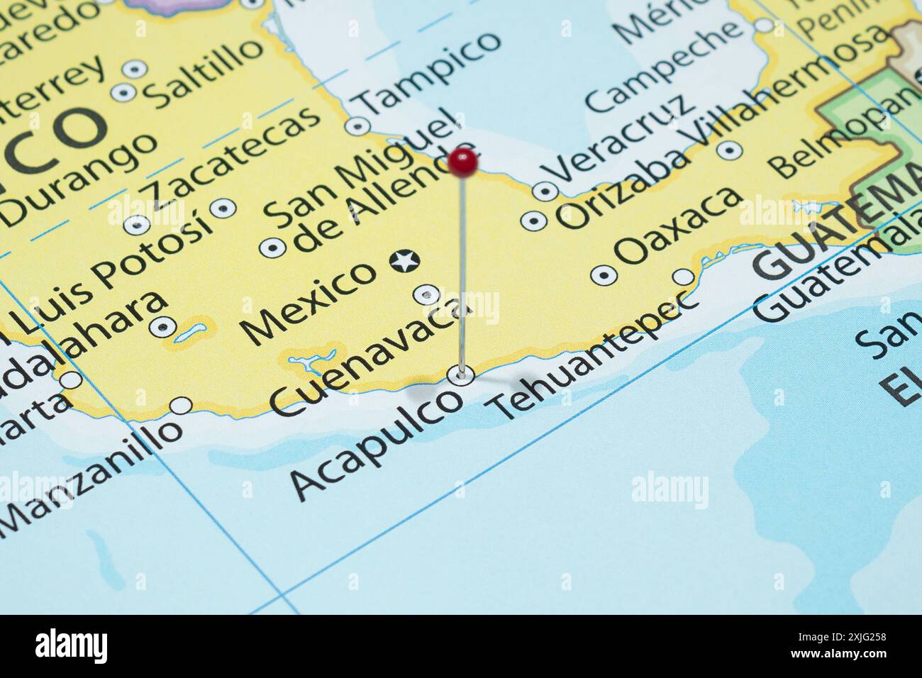Macro photography of Acapulco city with a red pin needle into Mexico ...