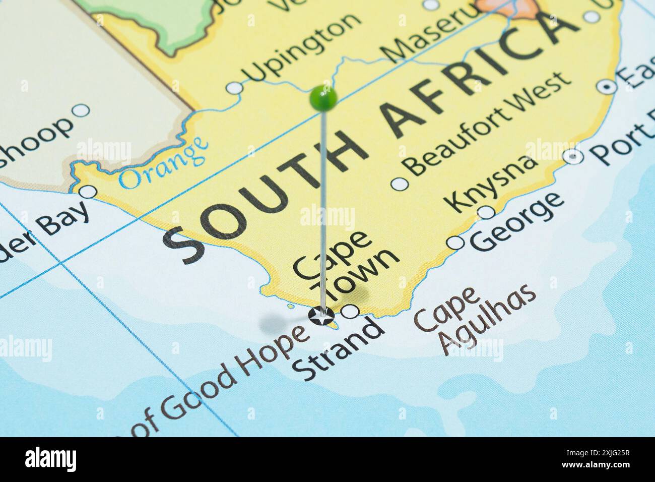 Close up to a Cape Town city with a green pin needle into South Africa ...