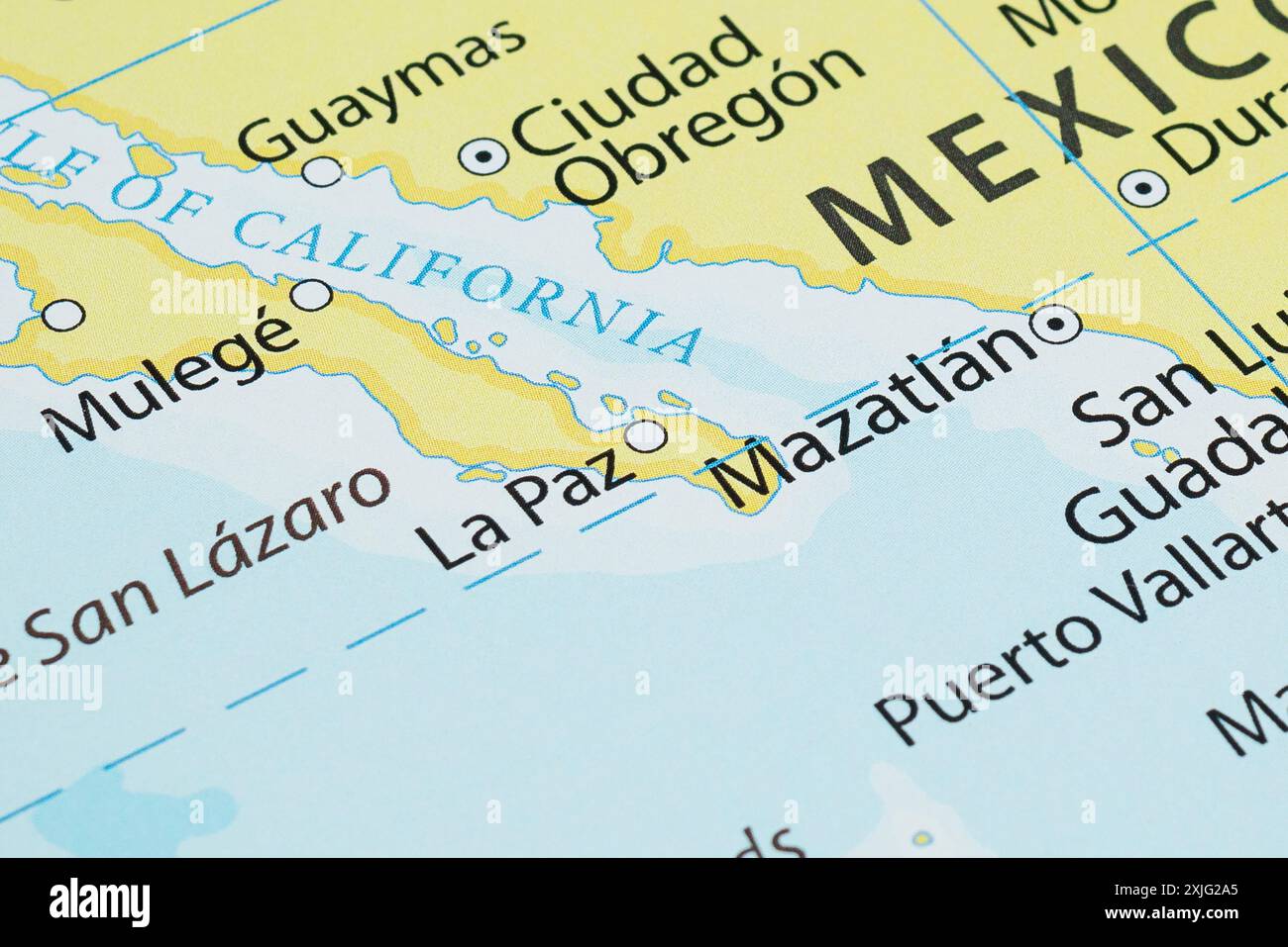 Macro photography of La Paz city into political mexican map with ...