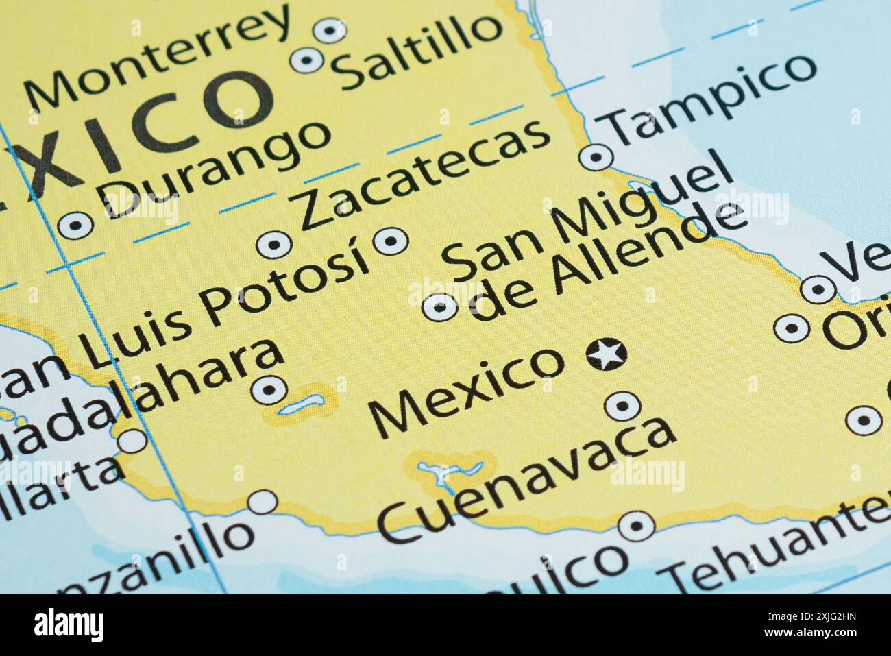 Macro photography of San Miguel Allende city into political mexican map ...