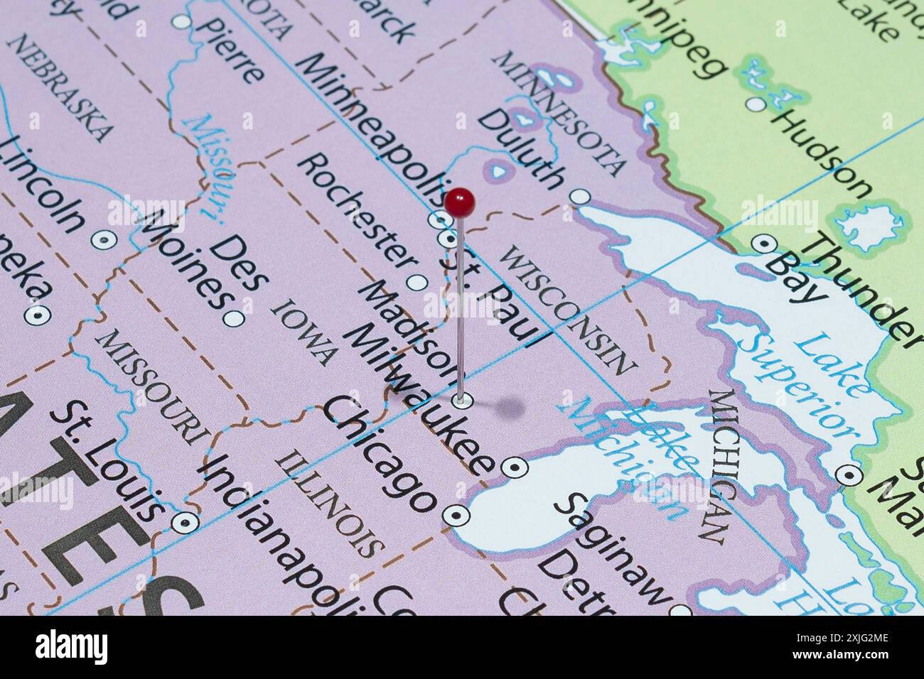 Close up to a Madison city with a red pin needle into United States of ...