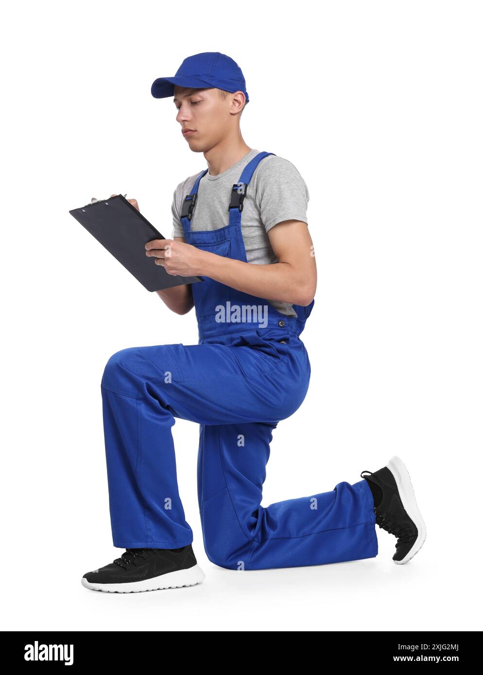 Professional car mechanic working Cut Out Stock Images & Pictures - Alamy