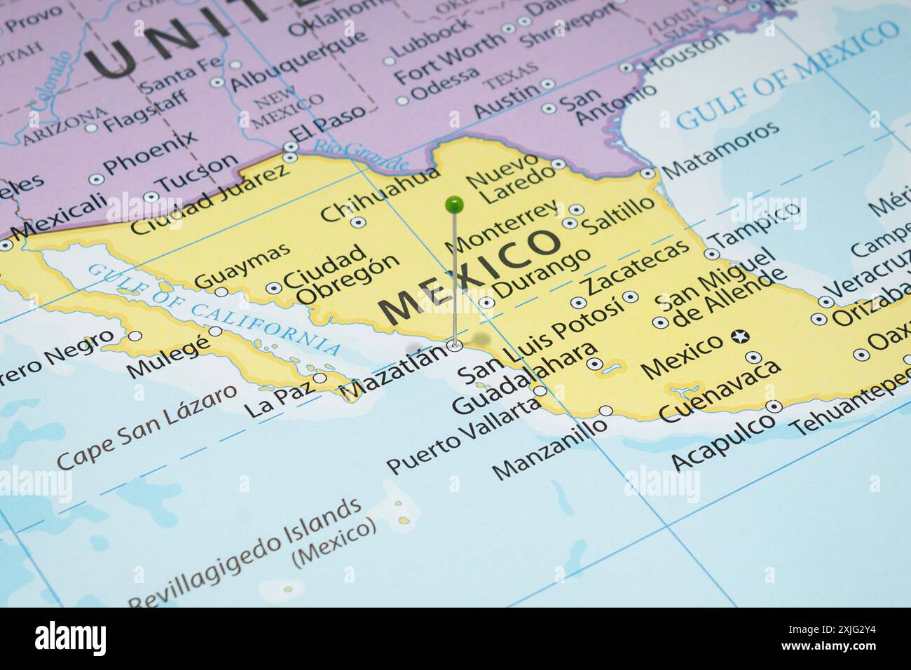 Close up to a Mazatlan city with a green pin needle into Mexico country ...