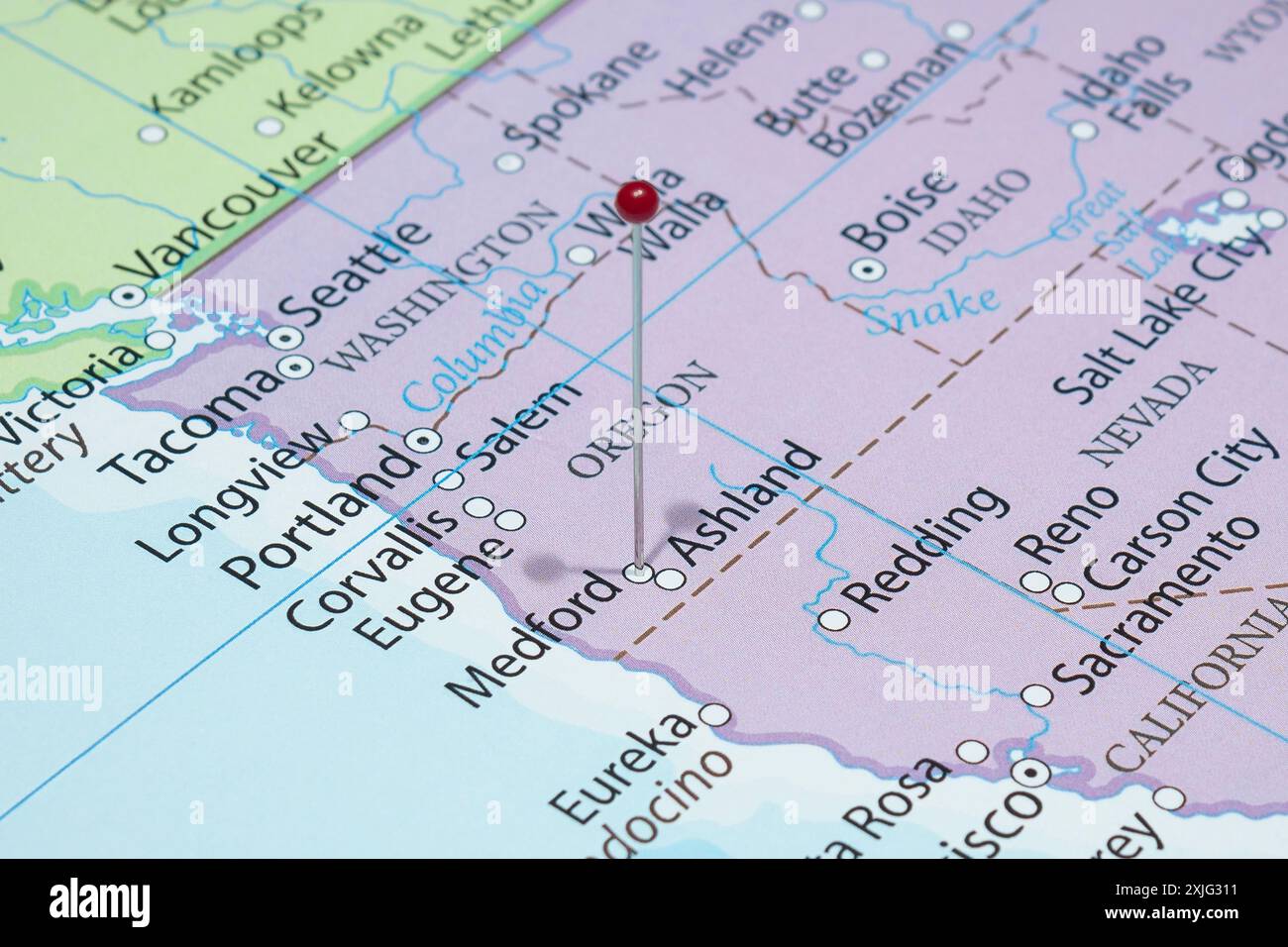 Close up to a Medford city with a red pin needle into United States of ...