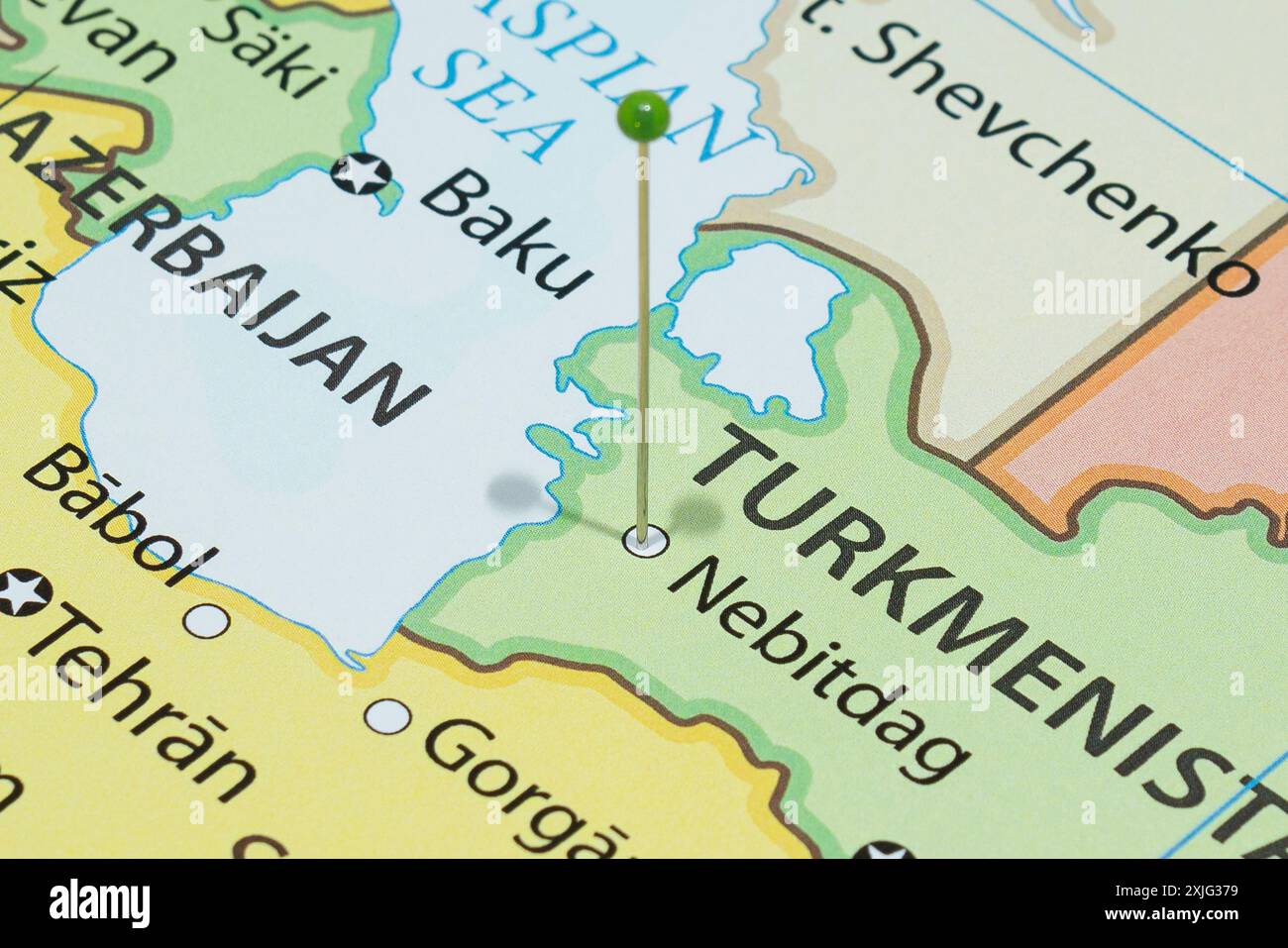 Close up to a Balkanabat city with a green pin needle into Turkmenistan ...