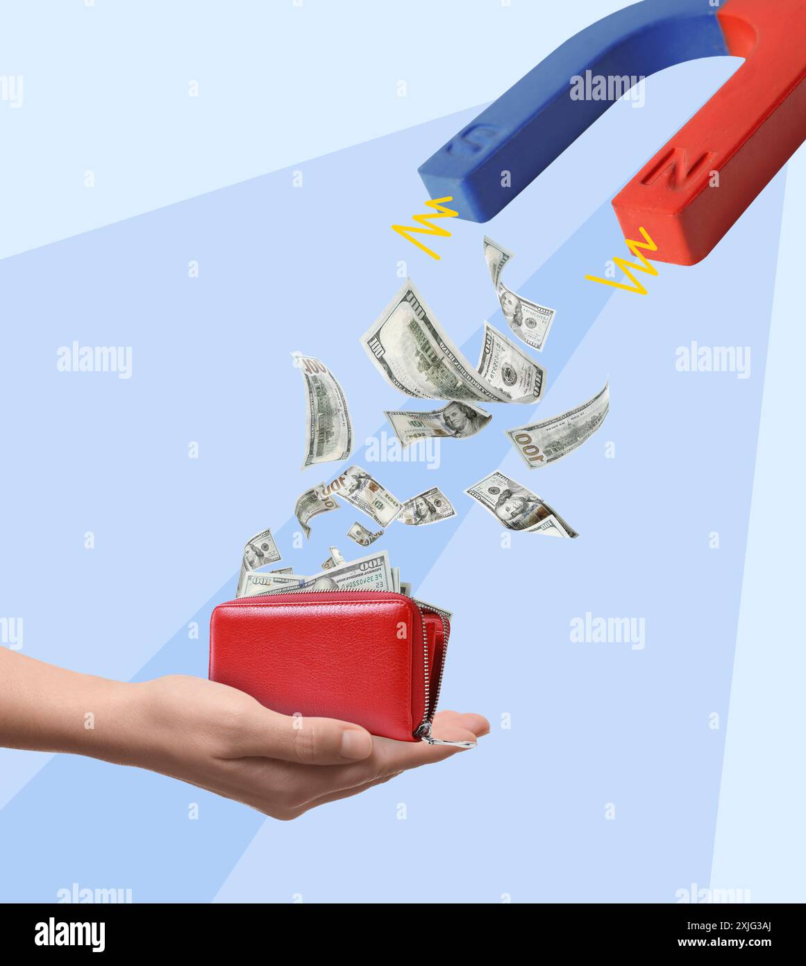 Magnet pulling dollars from woman's wallet on light blue striped ...