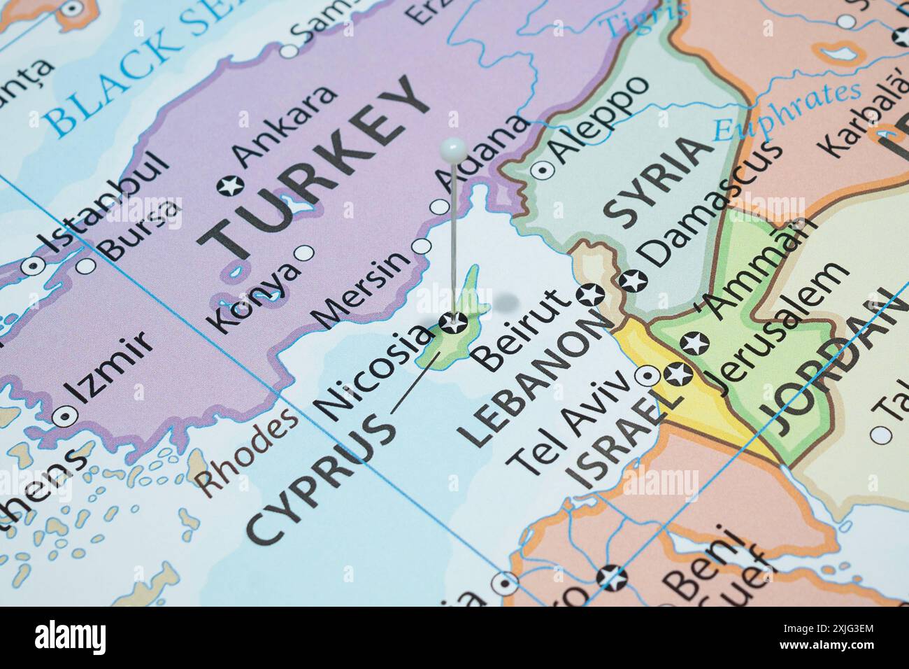 Close up to a Nicosia city with a white pin needle into Cyprus country ...