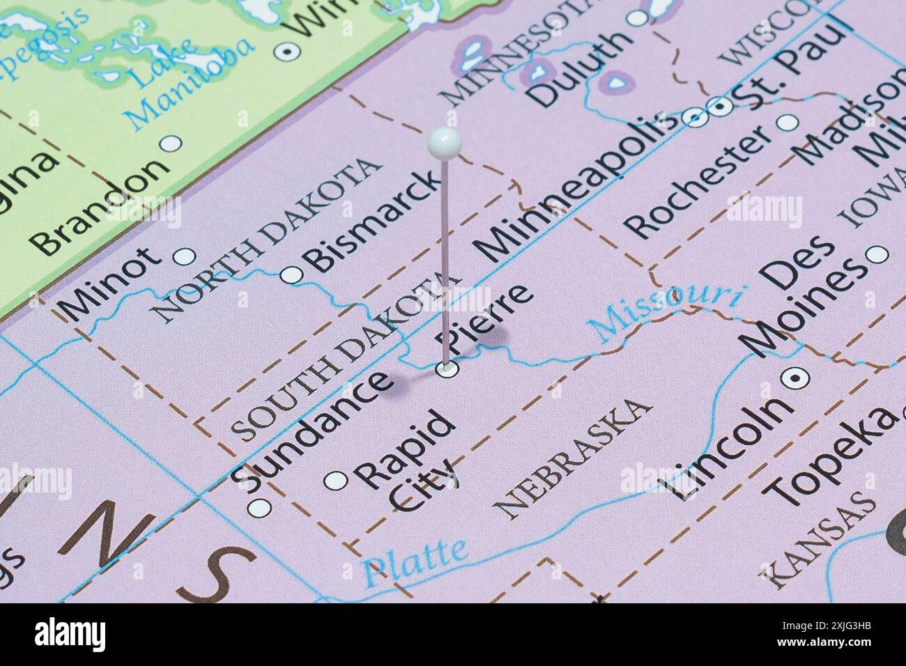 Close up to a Pierre city with a white pin needle into United States of ...