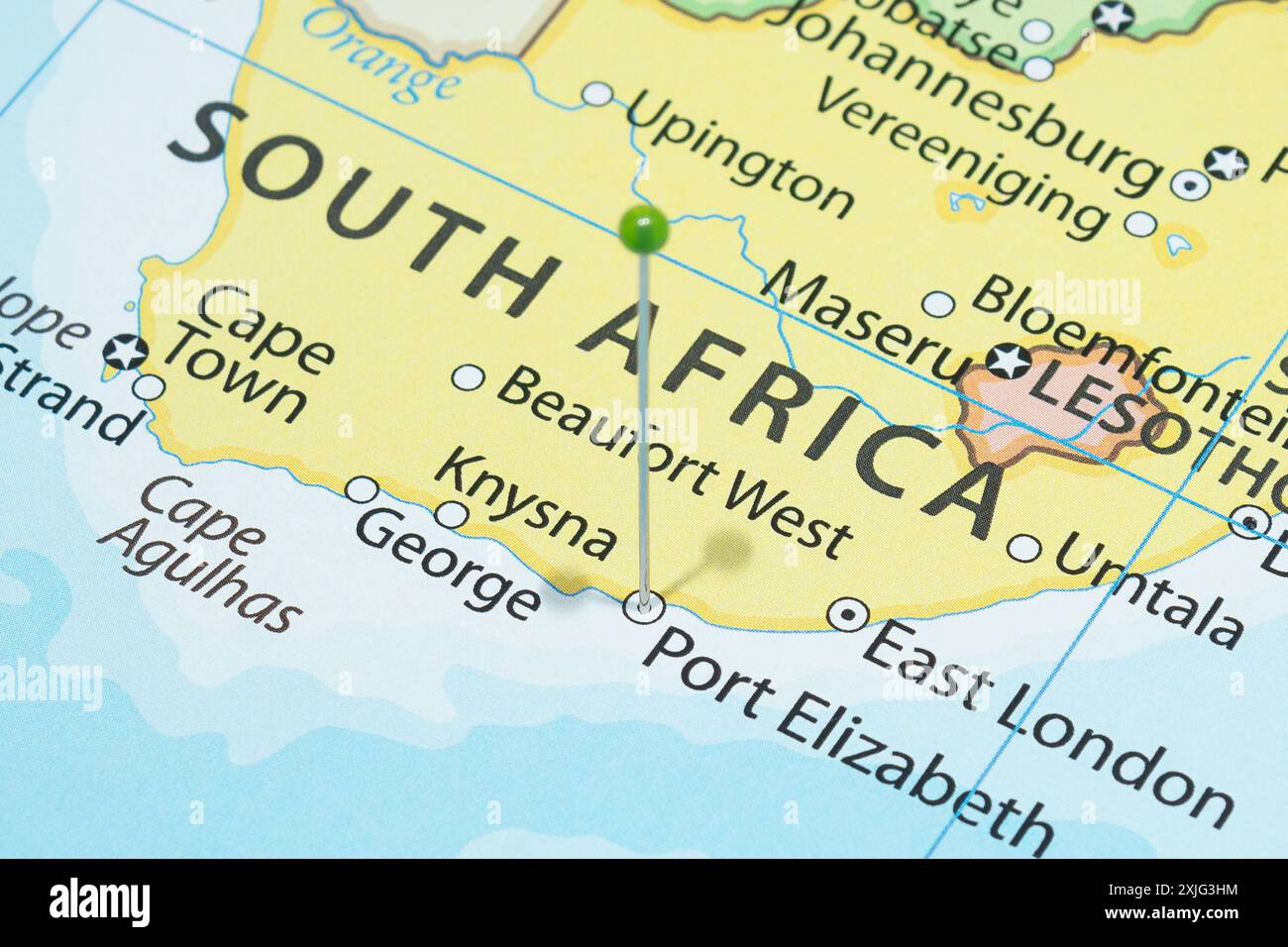 Close up to a Port Elizabeth city with a green pin needle into South ...