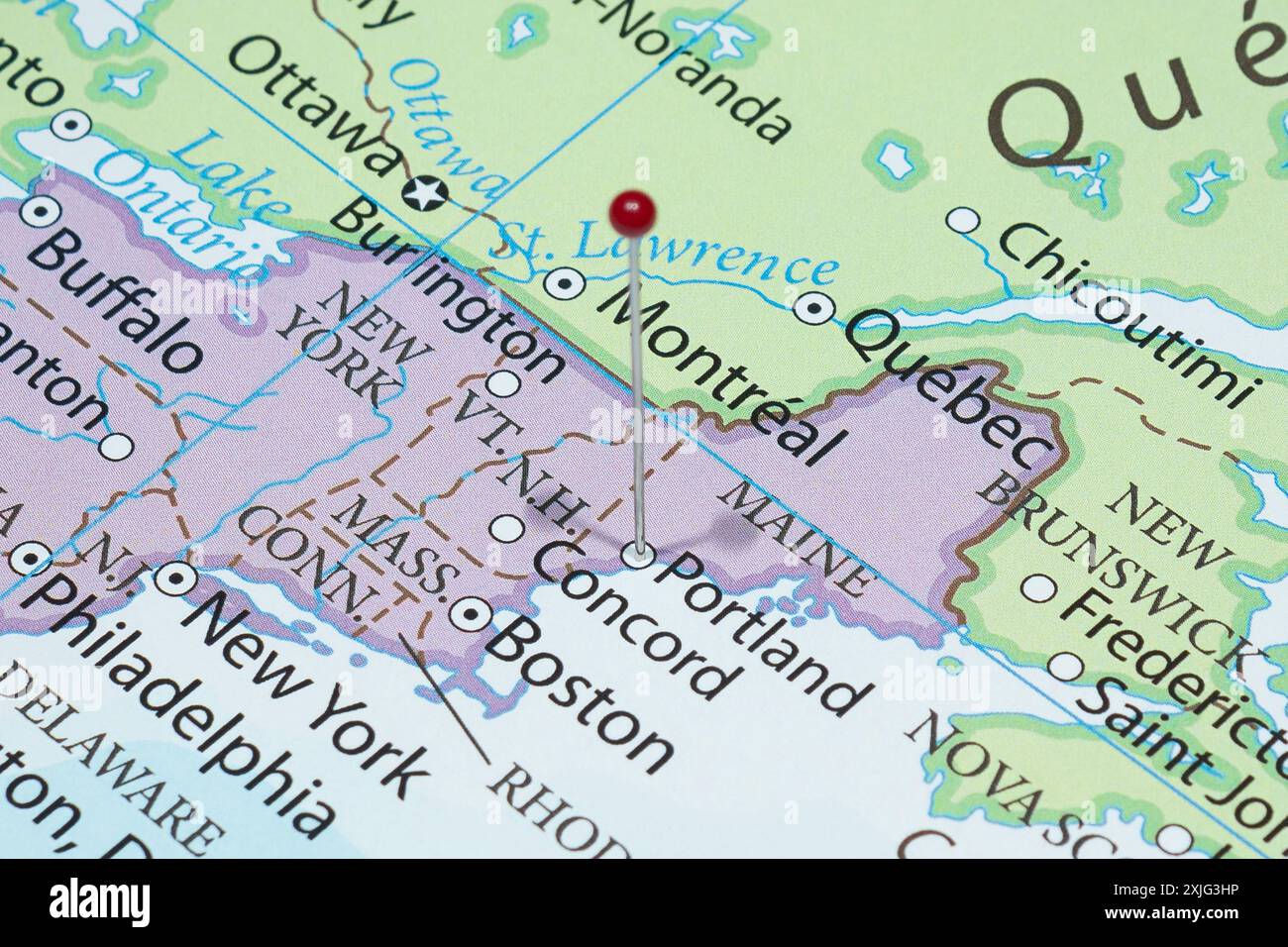 Close up to a Portland city with a red pin needle into United States of ...