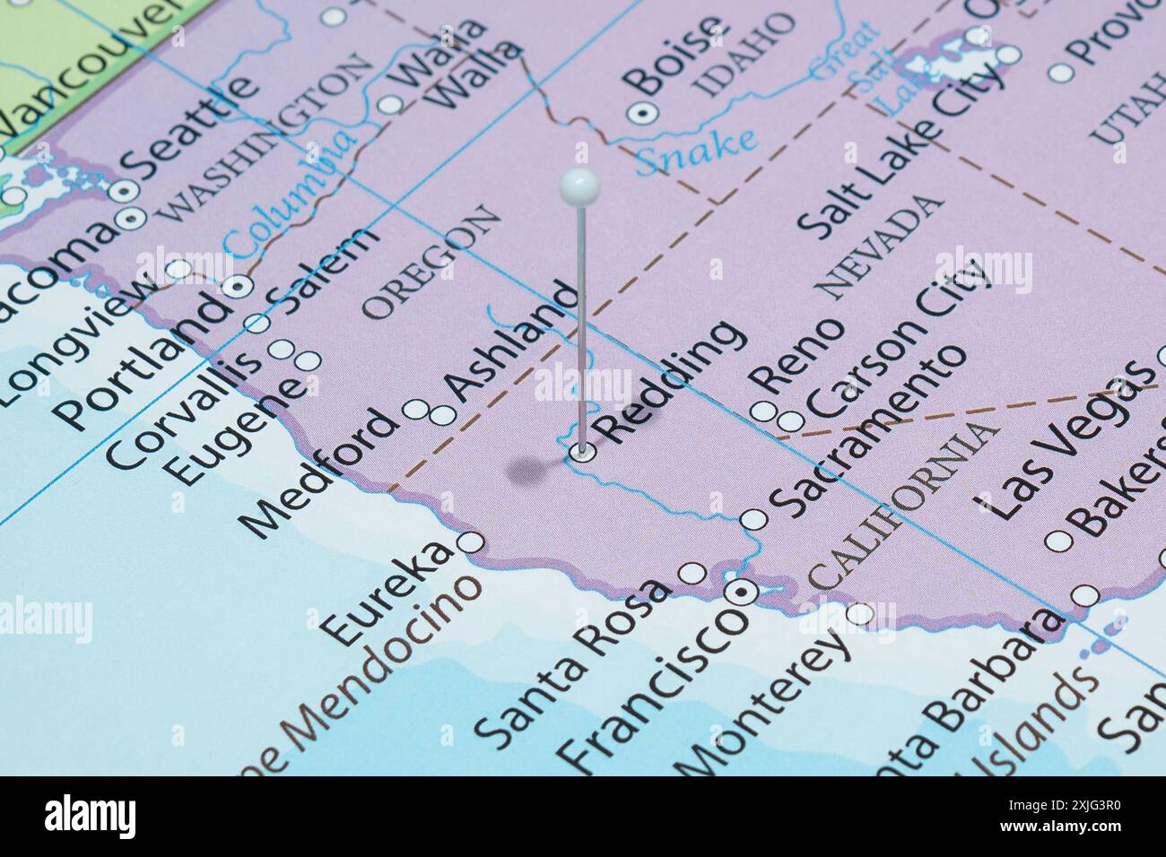 Close up to a Redding city with a white pin needle into United States ...