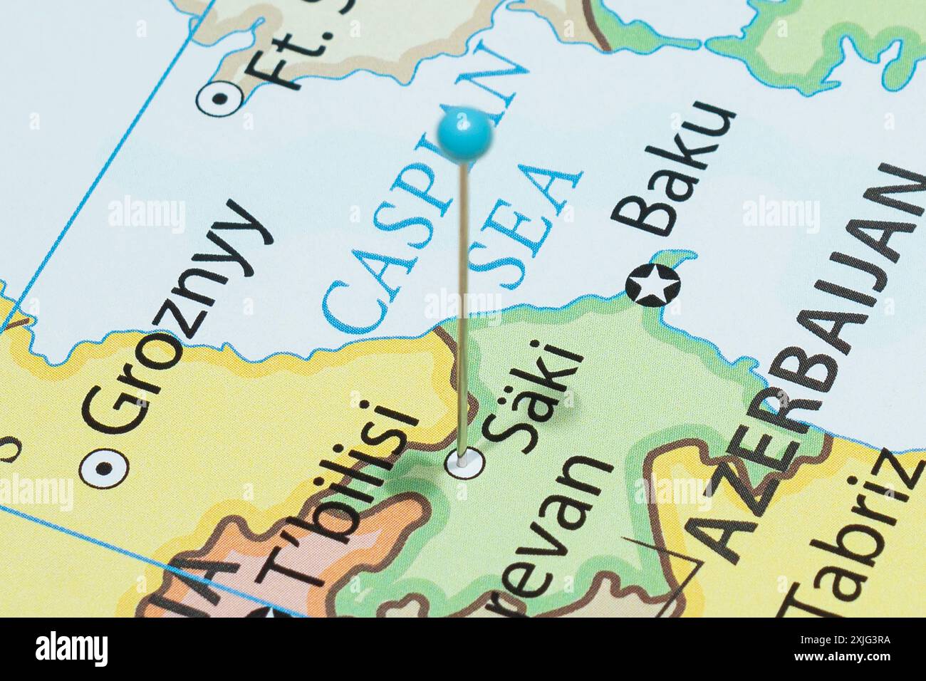 Close up to a Shaki city with a light blue pin needle into Azerbaijan ...