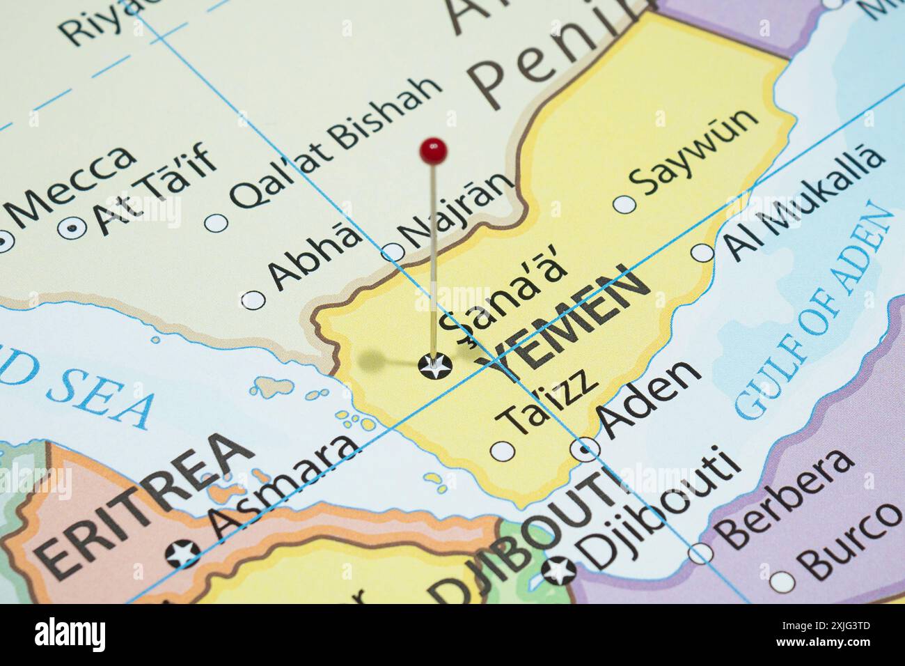 Close up to a Sanaa city with a red pin needle into Yemen country ...