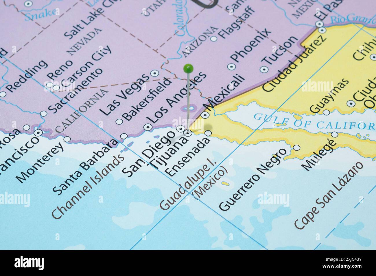 Close up to a Tijuana city with a green pin needle into Mexico country ...