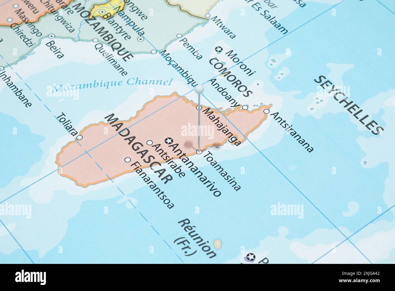Close up to a Toamasina city with a white pin needle into Madagascar ...