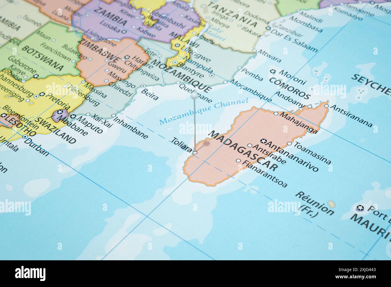 Close up to a Toliara city with a white pin needle into Madagascar ...