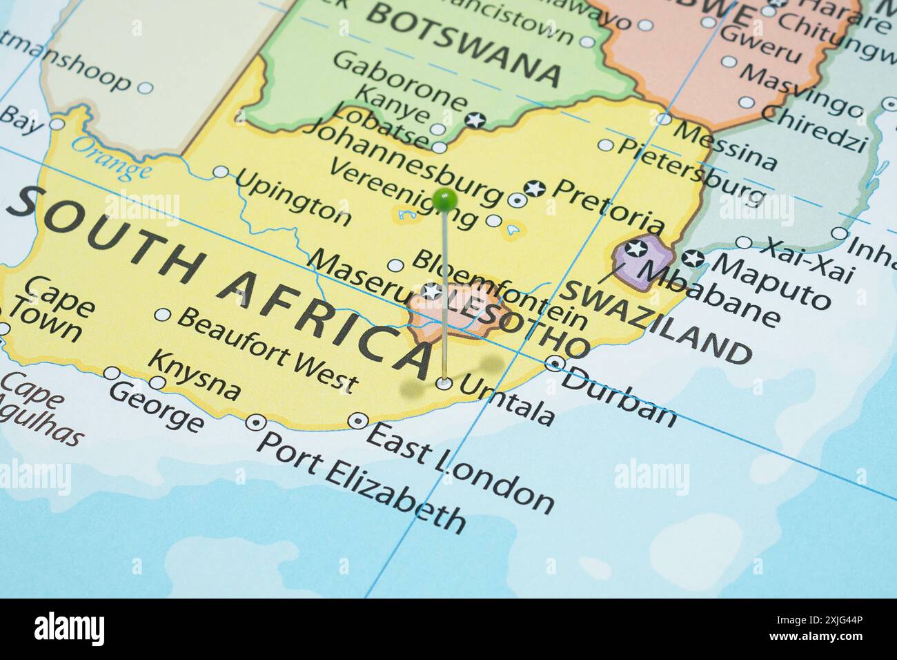 Close up to a Mthatha city with a green pin needle into South Africa ...