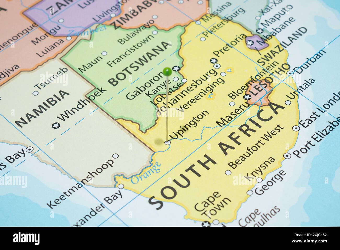 Close up to a Upington city with a green pin needle into South Africa ...