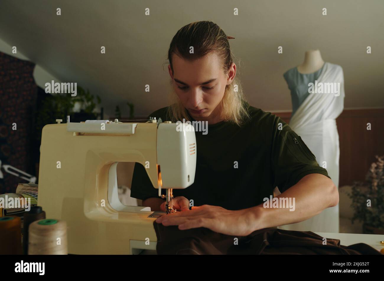 Tailor sewing workplace man hi-res stock photography and images - Alamy