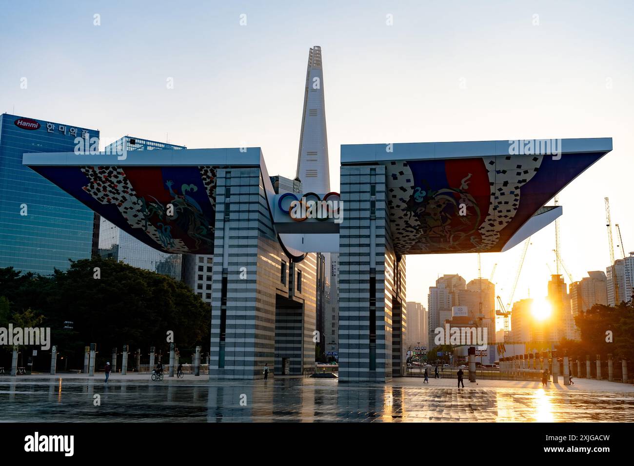 World peace gate and Lotte world tower at sunset Stock Photo - Alamy