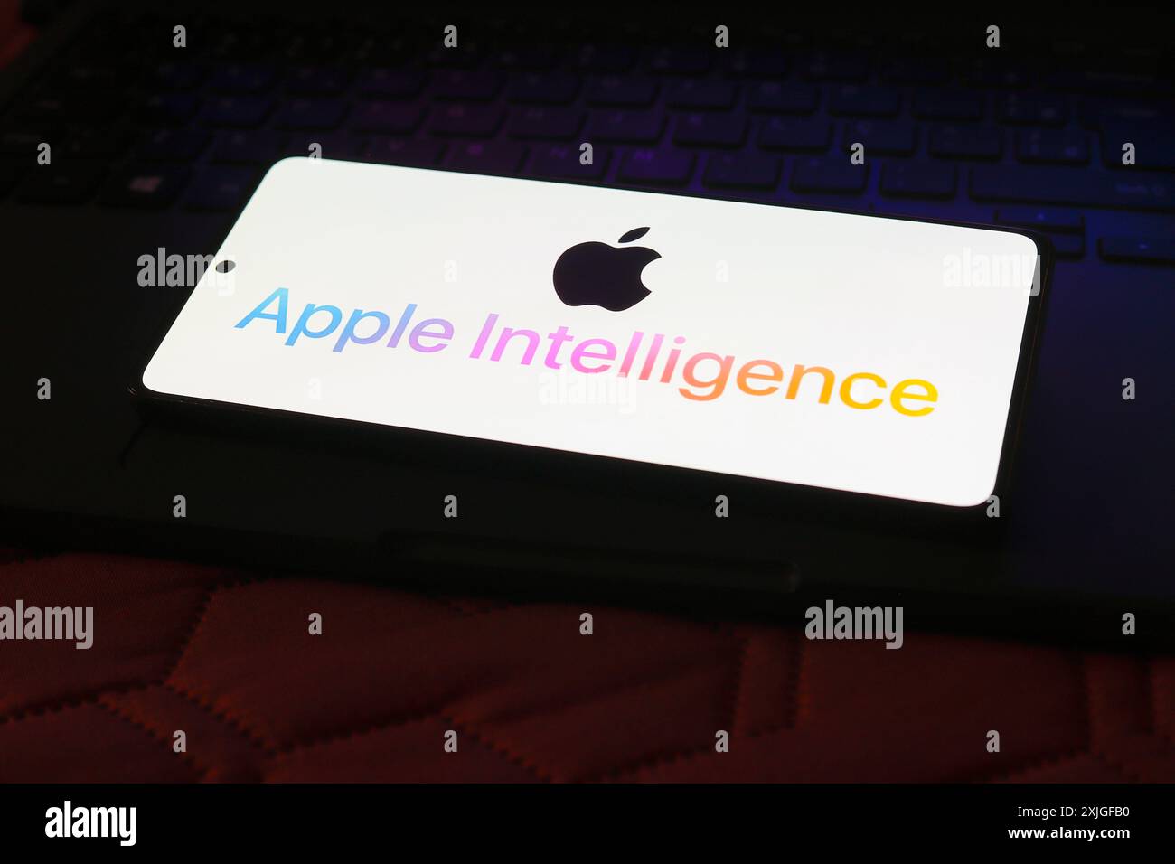 In this photo illustration, the Apple Intelligence logo is displayed on ...
