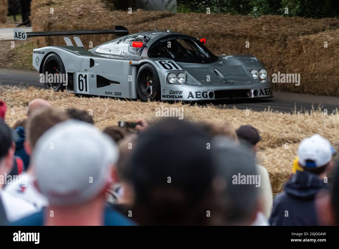 1989 Sauber-Mercedes C9 race car driving up the hill climb track at the ...