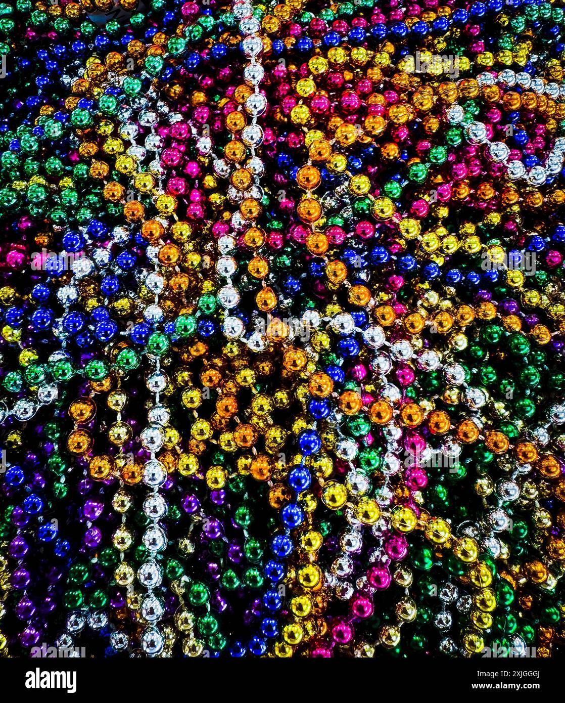 A pile of colorful Mardi Gras Beads Stock Photo - Alamy