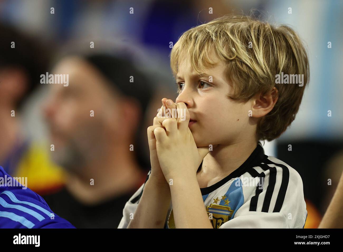 Argentina’s fans watch their team play and show gestures of anguish and ...