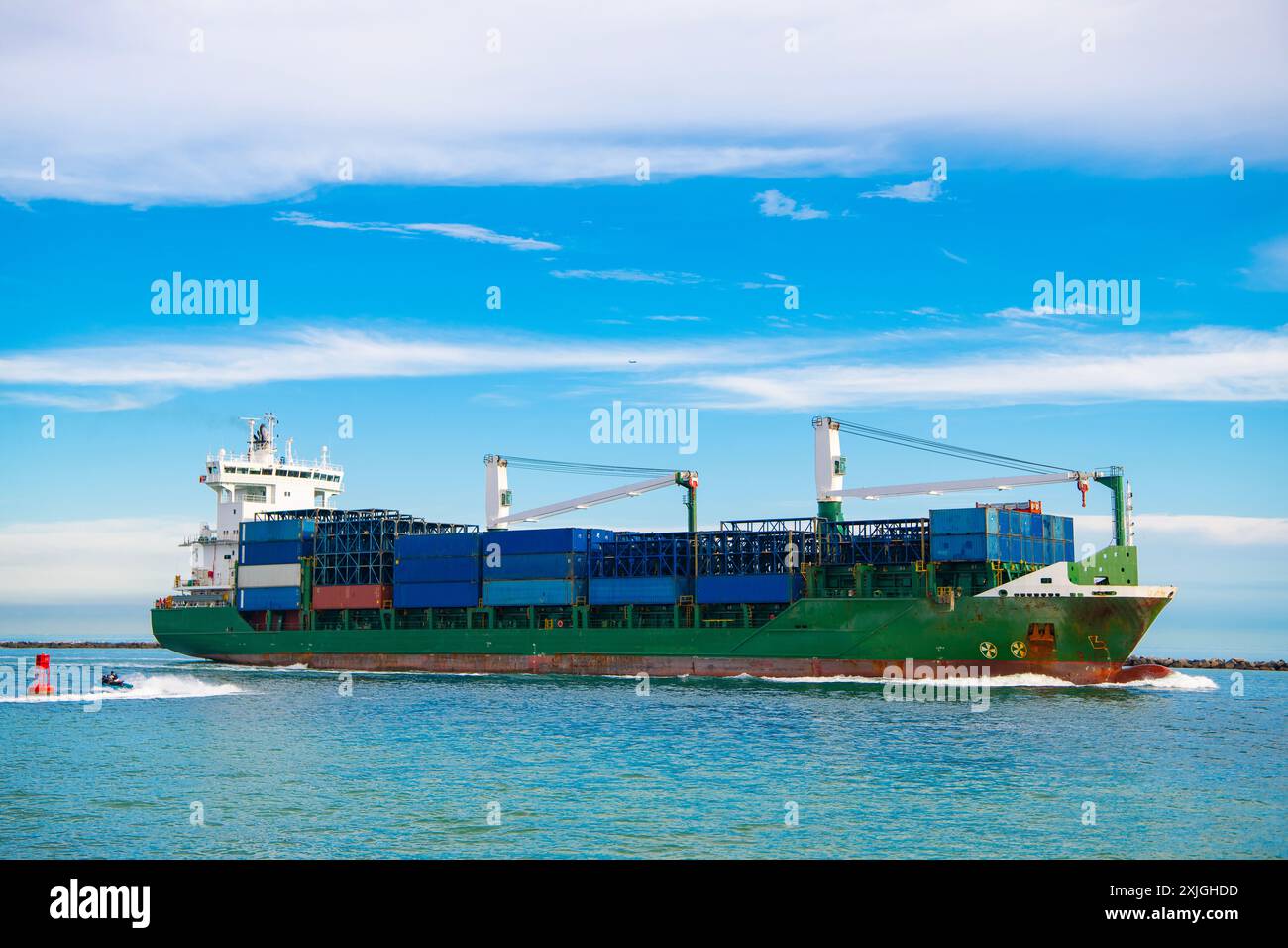 Container on barge at Port Miami. Cargo ship barge at harbor with ...