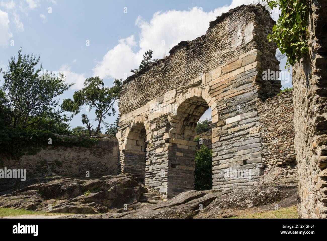 Remains of the Roman aqueduct in Susa, typical and small town in ...