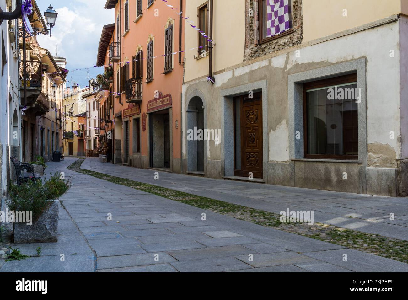Typical street of the historic center of Susa, small town in Northern ...