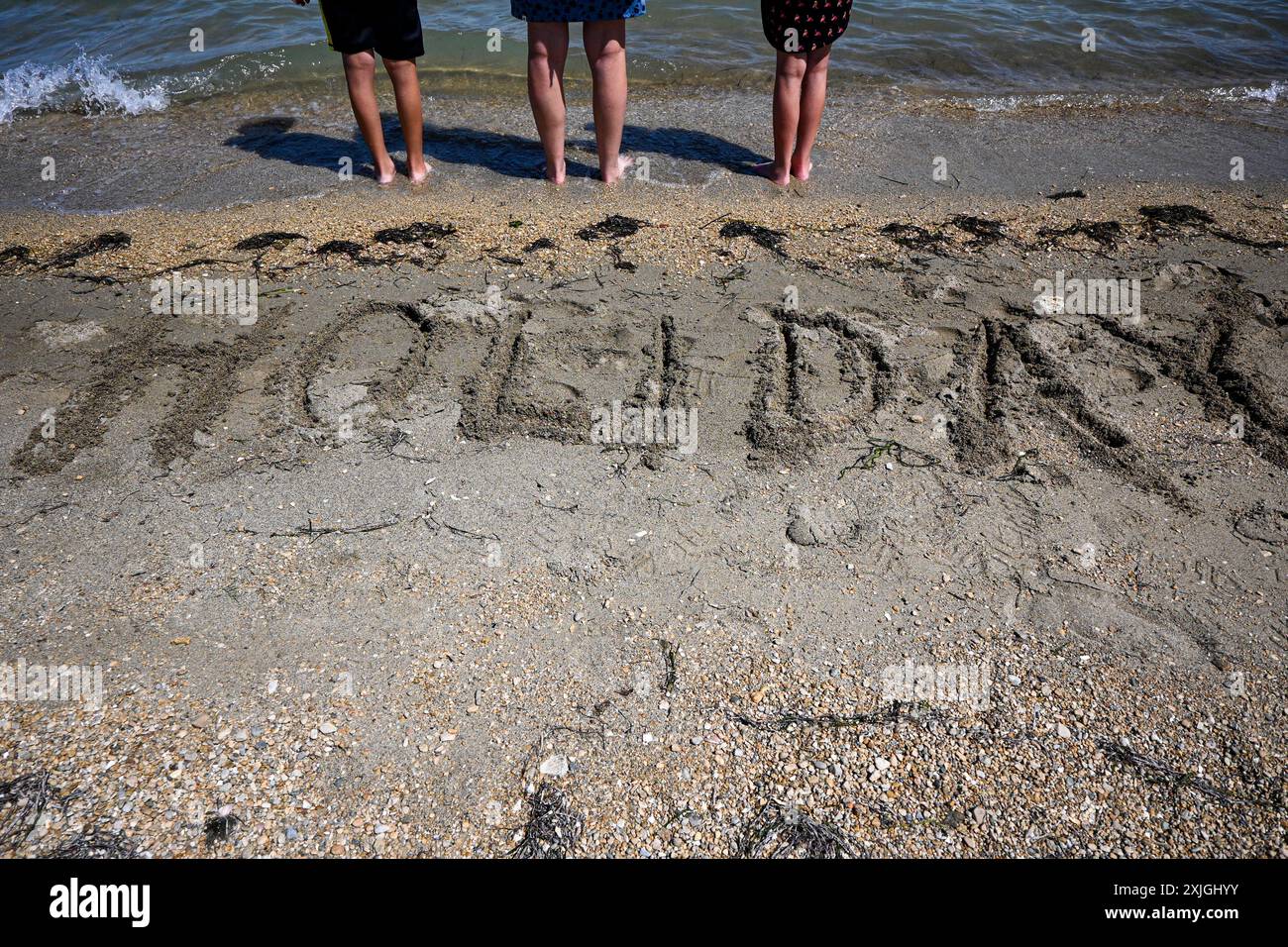 Sand beach writing message hi-res stock photography and images - Alamy