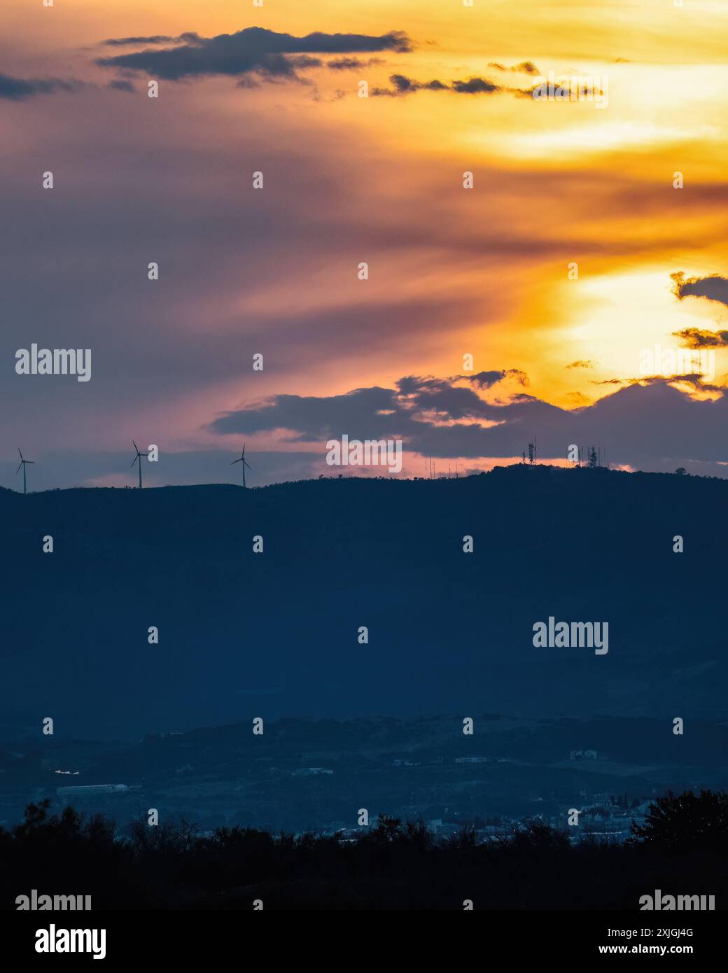 Wind turbines on the mountain near to wetland National Park Delta Evros ...