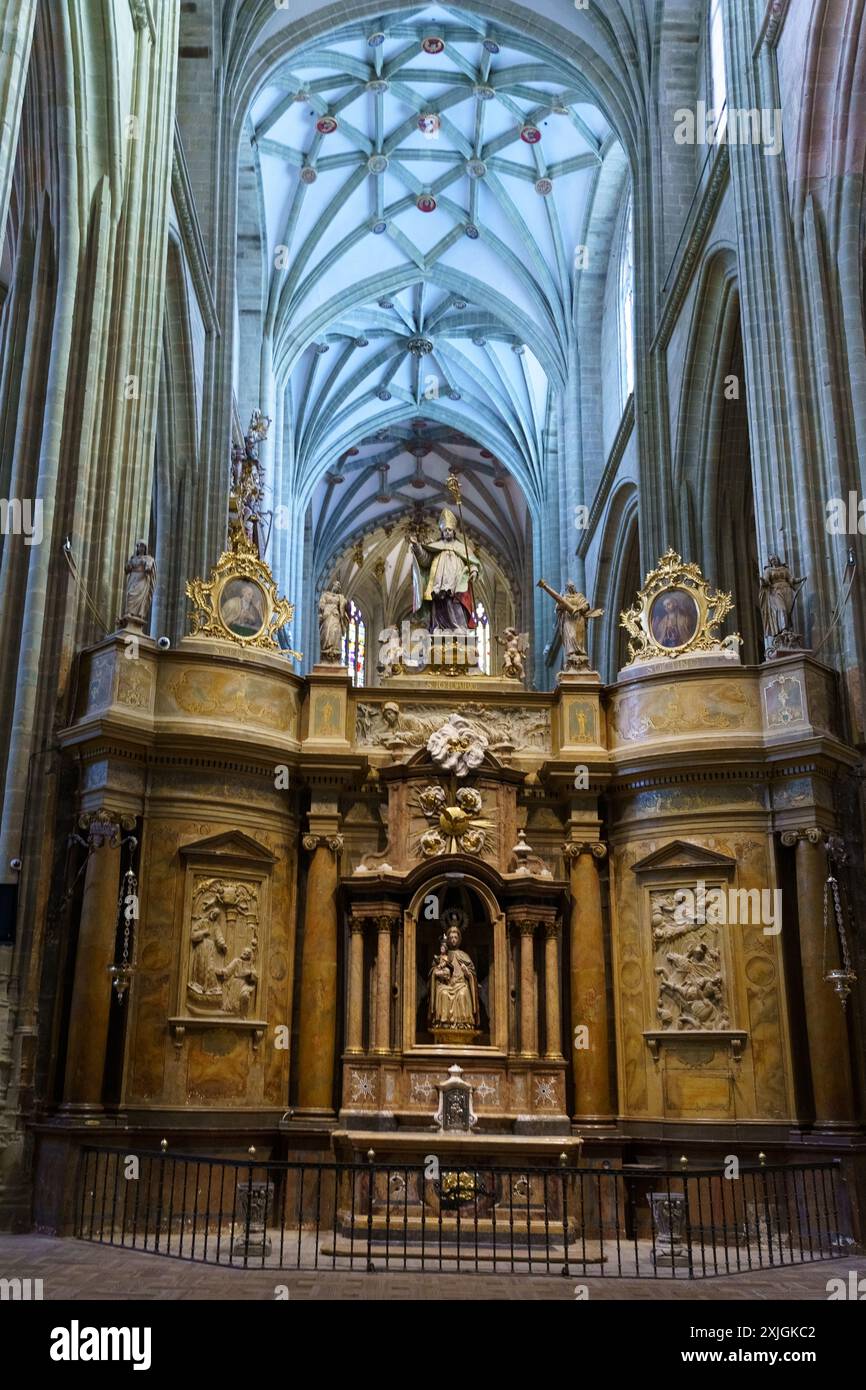 Astorga, Spain - June 4, 2023: The ornate, gold-gilded altar within the ...