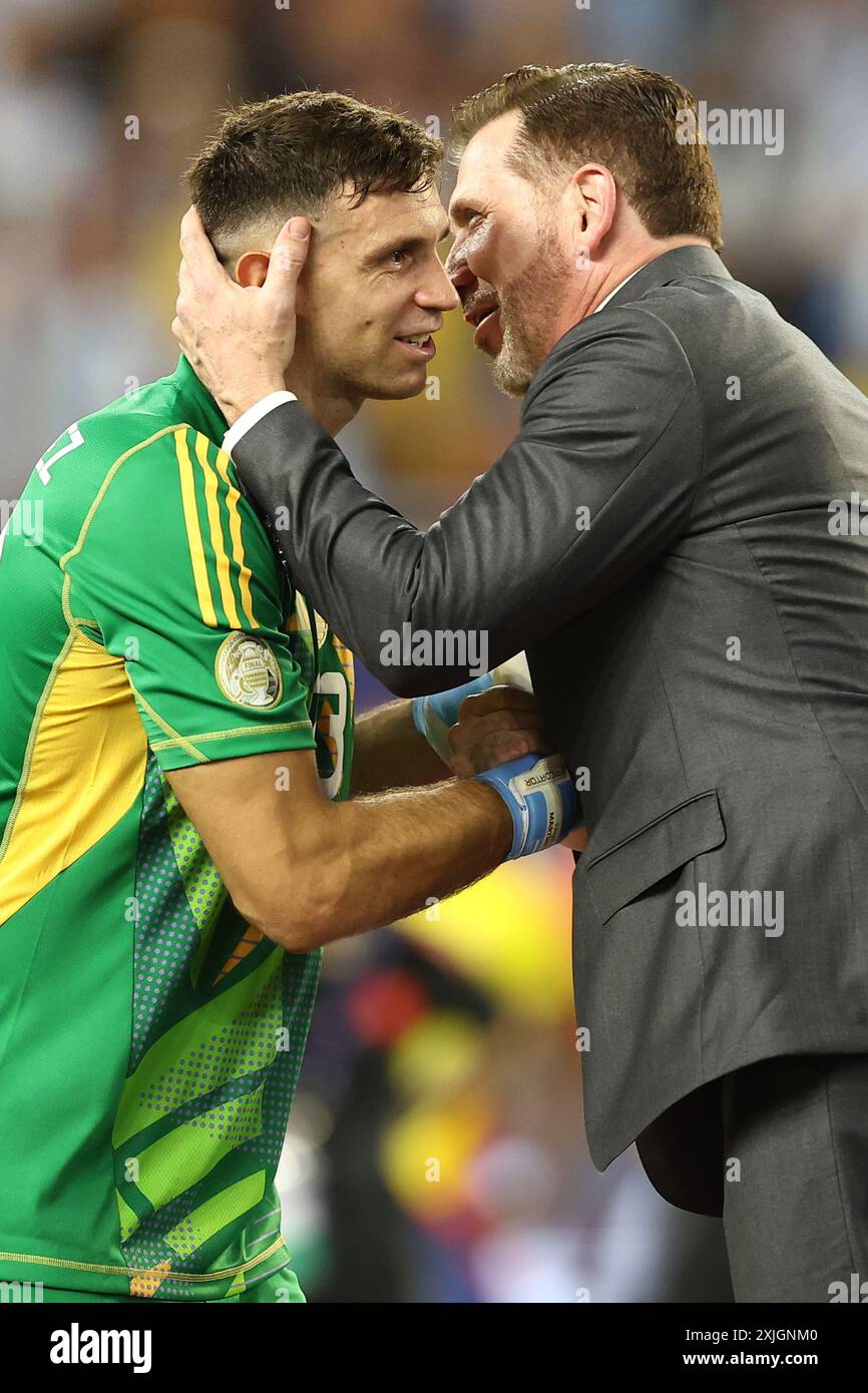 CONMEBOL's President Alejandro Dominguez (R) greets Argentina's ...
