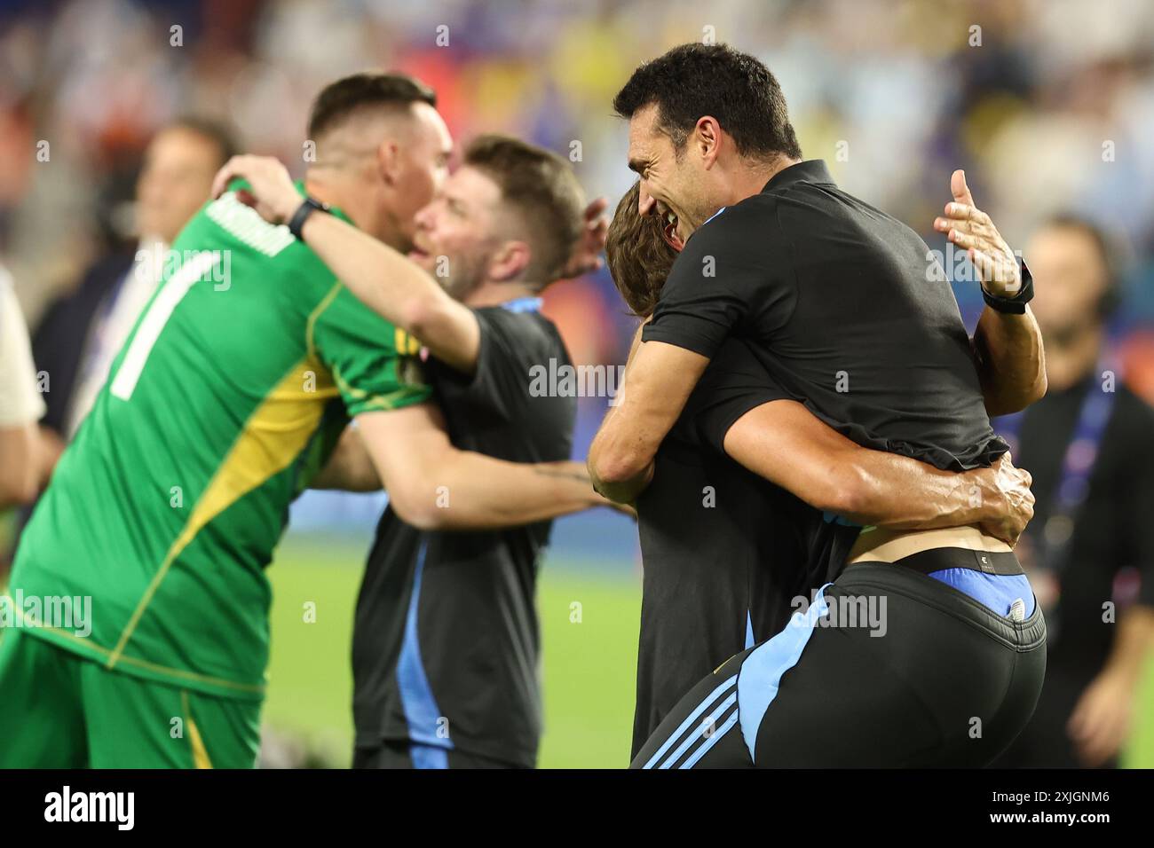 Argentina's head coach Lionel Scaloni (R) celebrates with assistants ...
