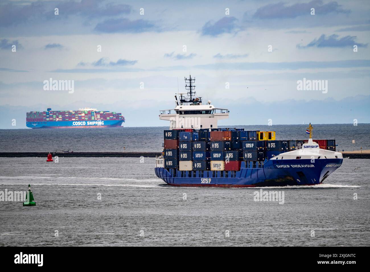 Entry to the seaport of Rotterdam, container freighter, feedership ...