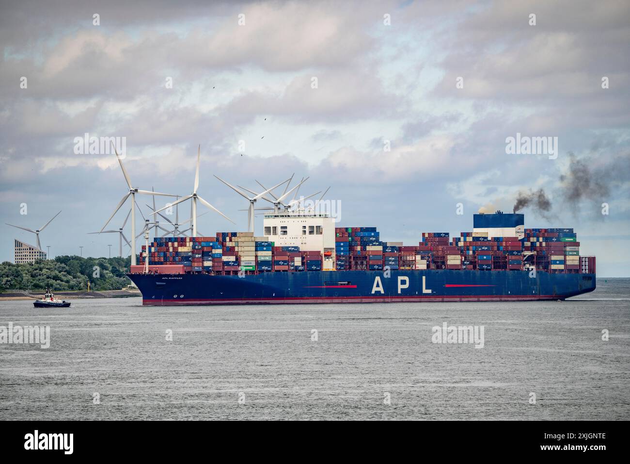 Entrance to the seaport of Rotterdam, APL Raffles container freighter ...