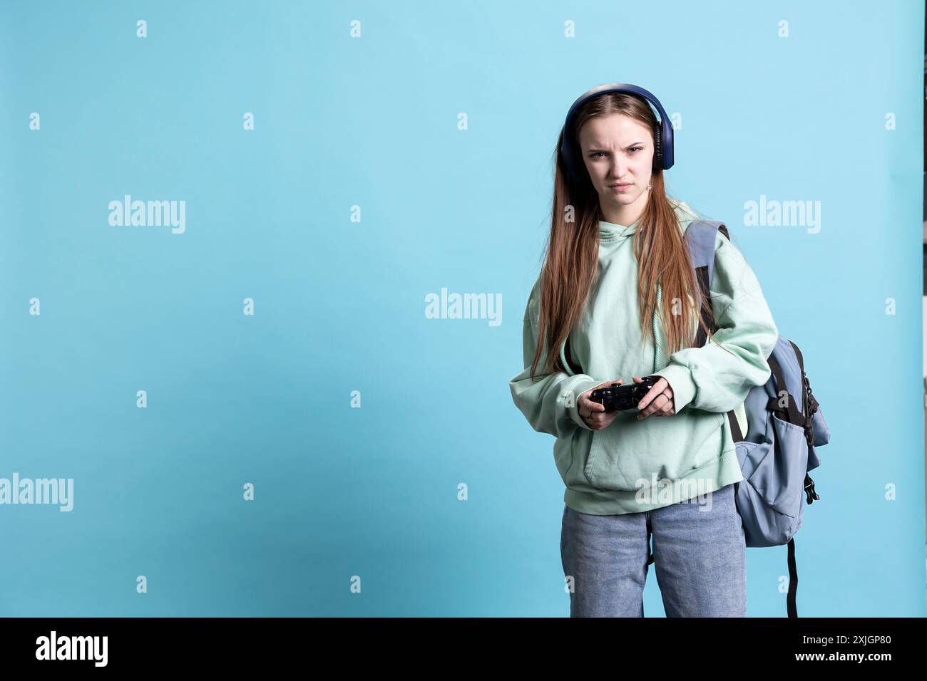 Gamer with disappointed look on face after receiving game over screen ...