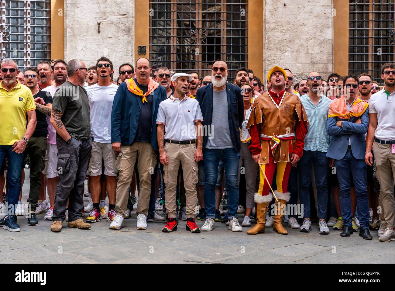 The Valdimontone Contrada Arrive In The Piazza Del Campo With Their ...