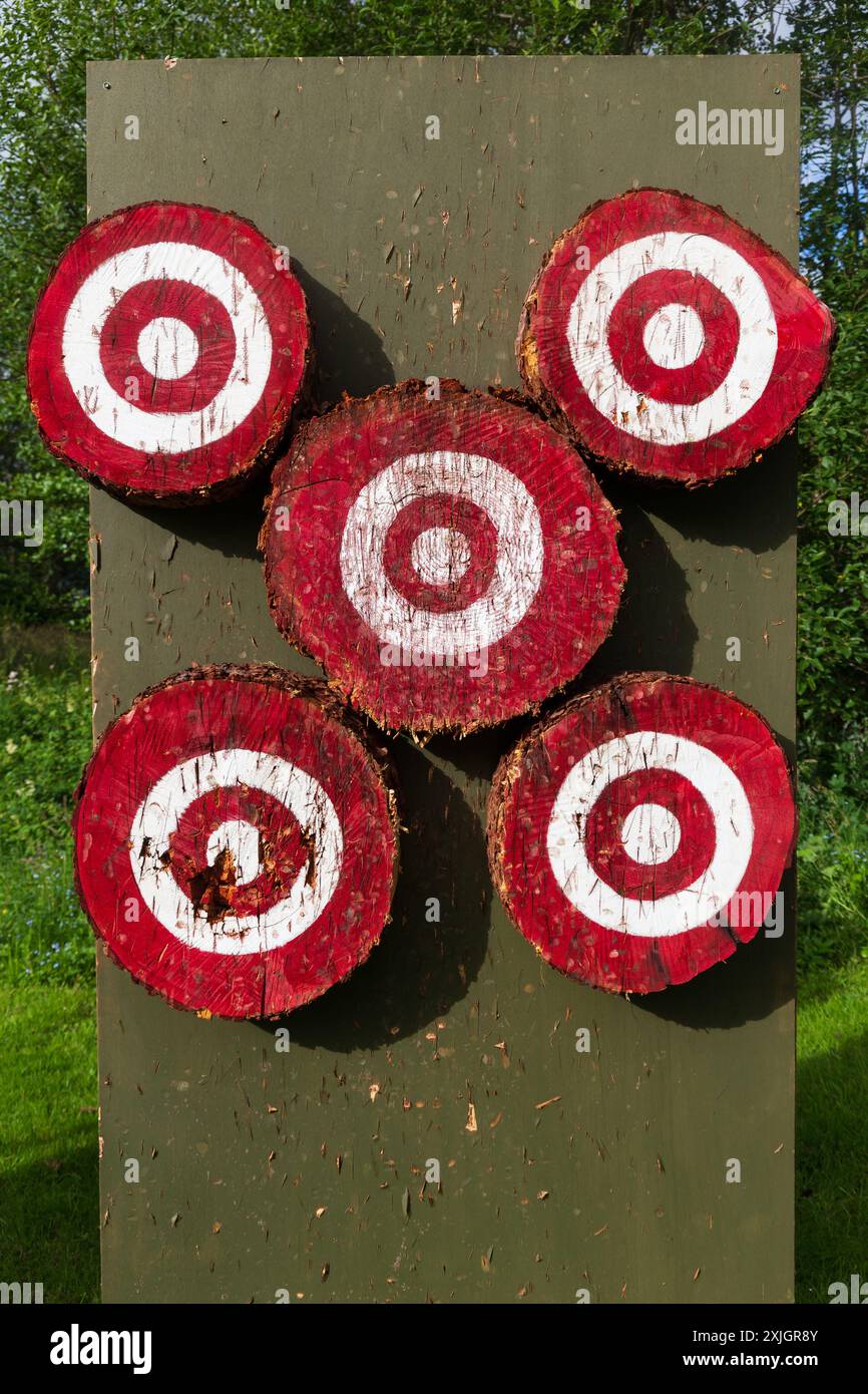 Targets used for the sport of axe throwing in the Scottish Highlands on a summers day Stock ...