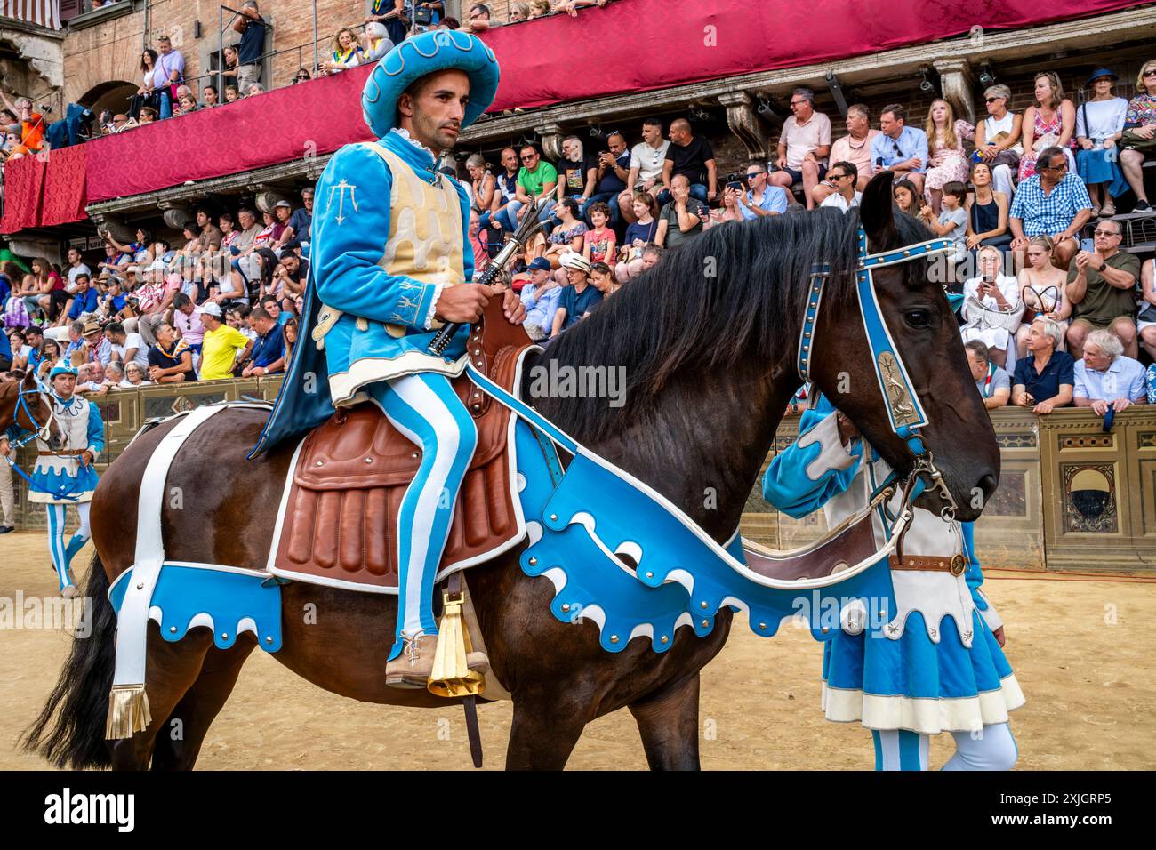 The Jockey From The Onda (Wave) Contrada Dressed In Medieval Costume ...