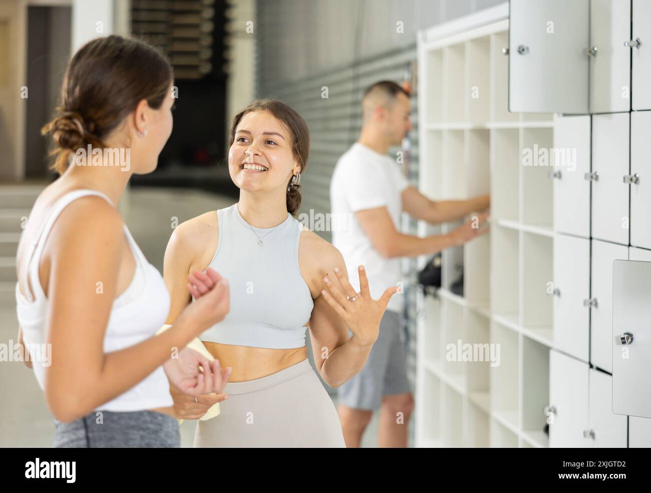 Two joyful women in sportswear hi-res stock photography and images - Alamy
