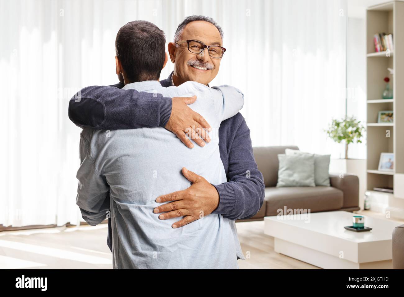 Men greeting each other hi-res stock photography and images - Alamy